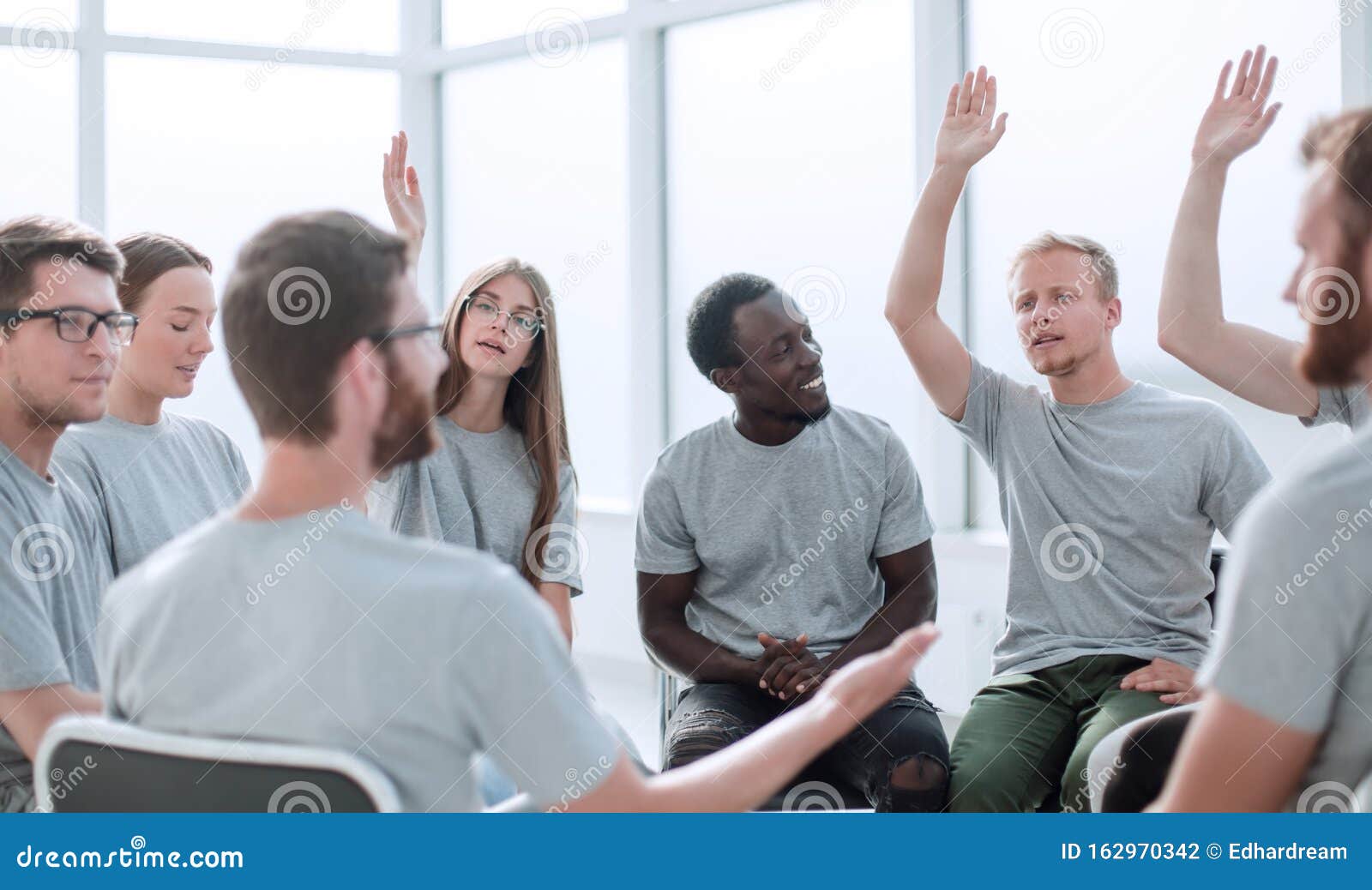 Young People Ask Questions during the Meeting Stock Photo - Image of ...