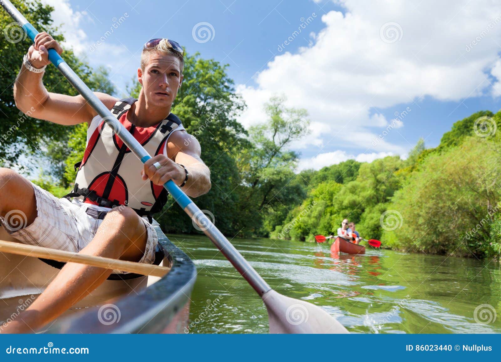 Young People Canoeing stock photo. Image of sports, motion - 86023440
