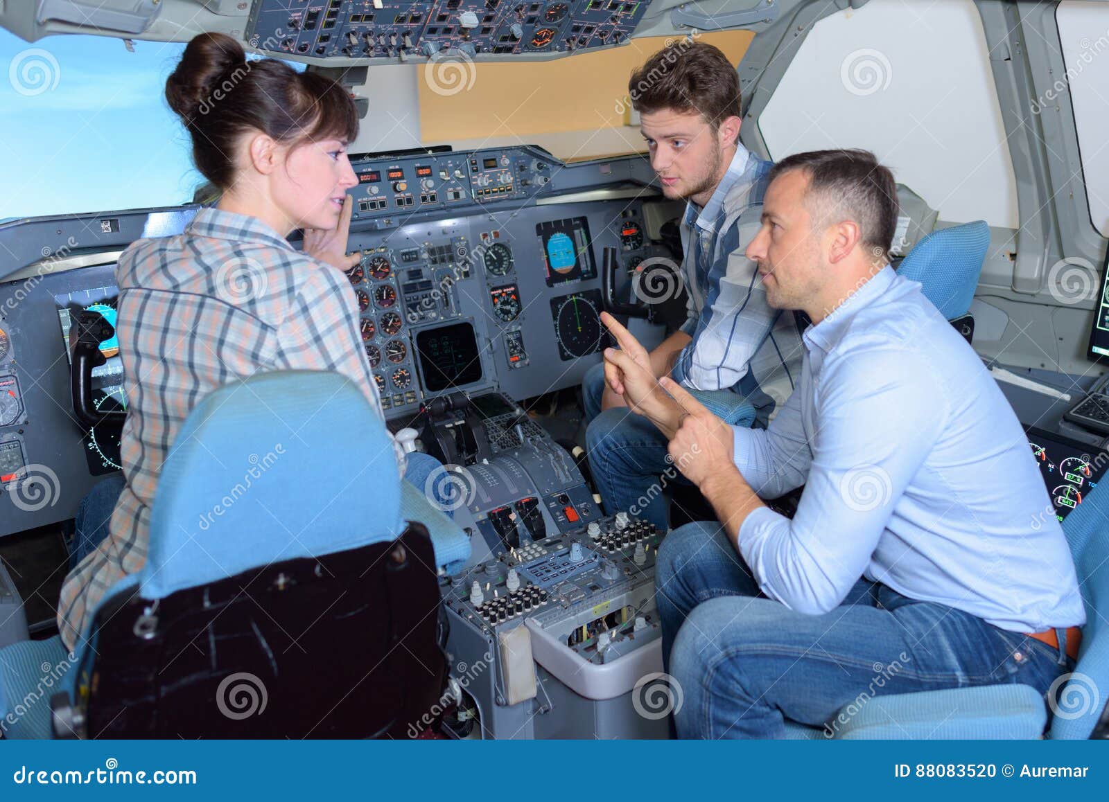 Young People in Cockpit Aircraft with Instructor Stock Photo - Image of ...
