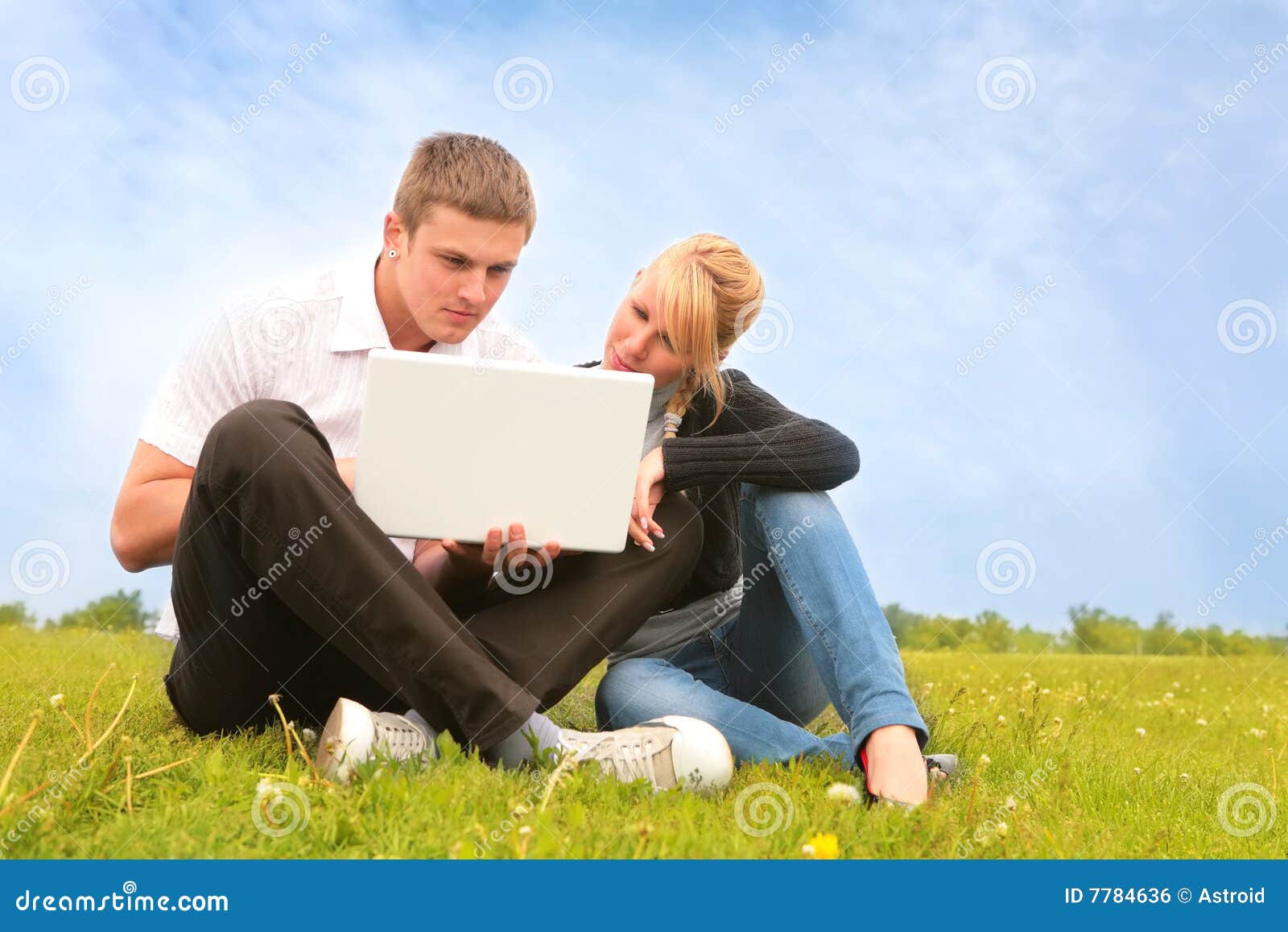 Young people and computer stock photo. Image of green - 7784636