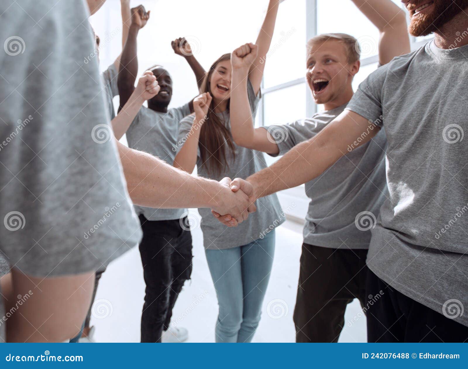 Young People Congratulating Each Other on the Victory Stock Photo ...