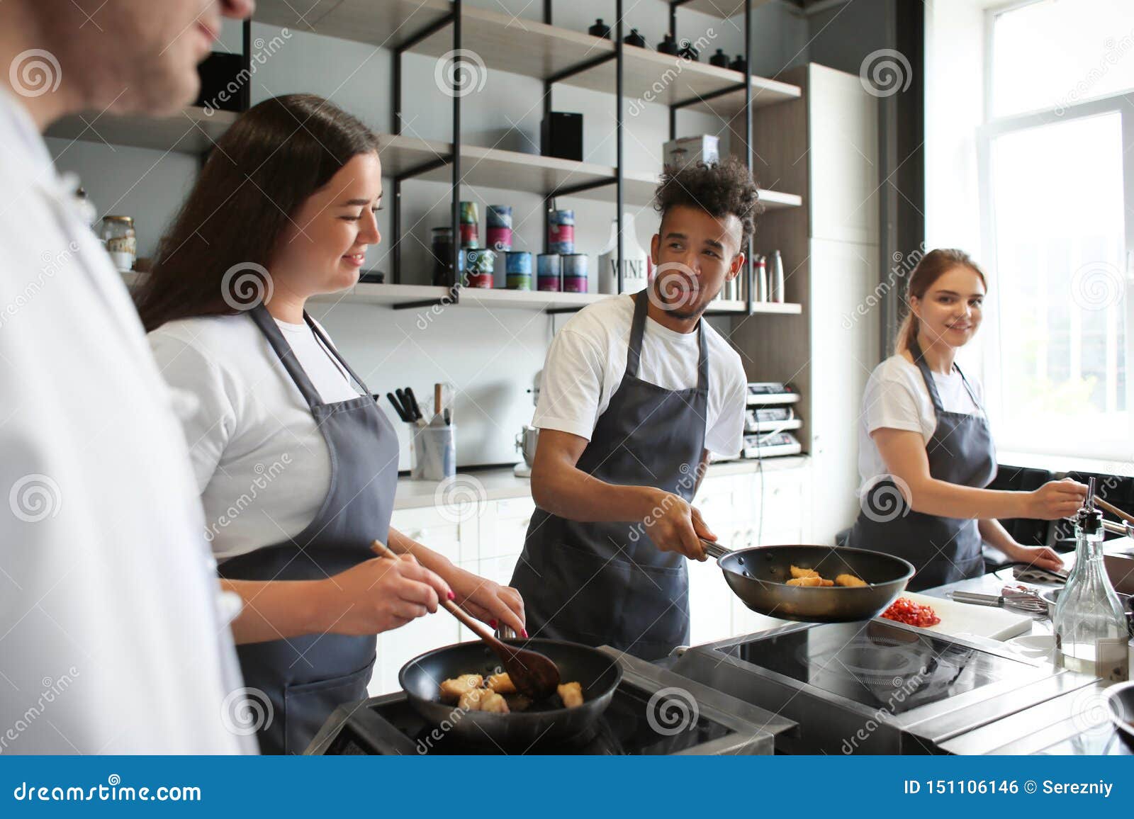 Young People during Cooking Classes in Restaurant Kitchen Stock Photo ...