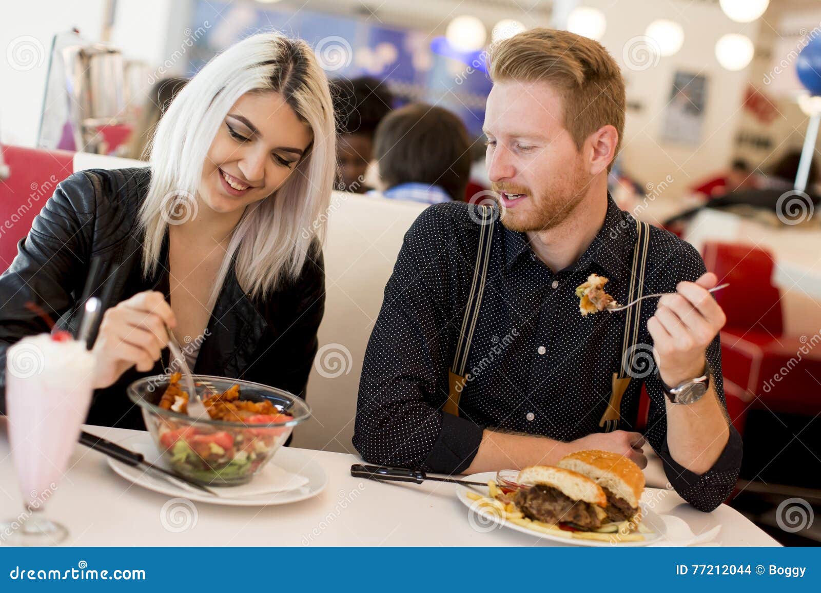 Young people in diner stock photo. Image of table, diner - 77212044