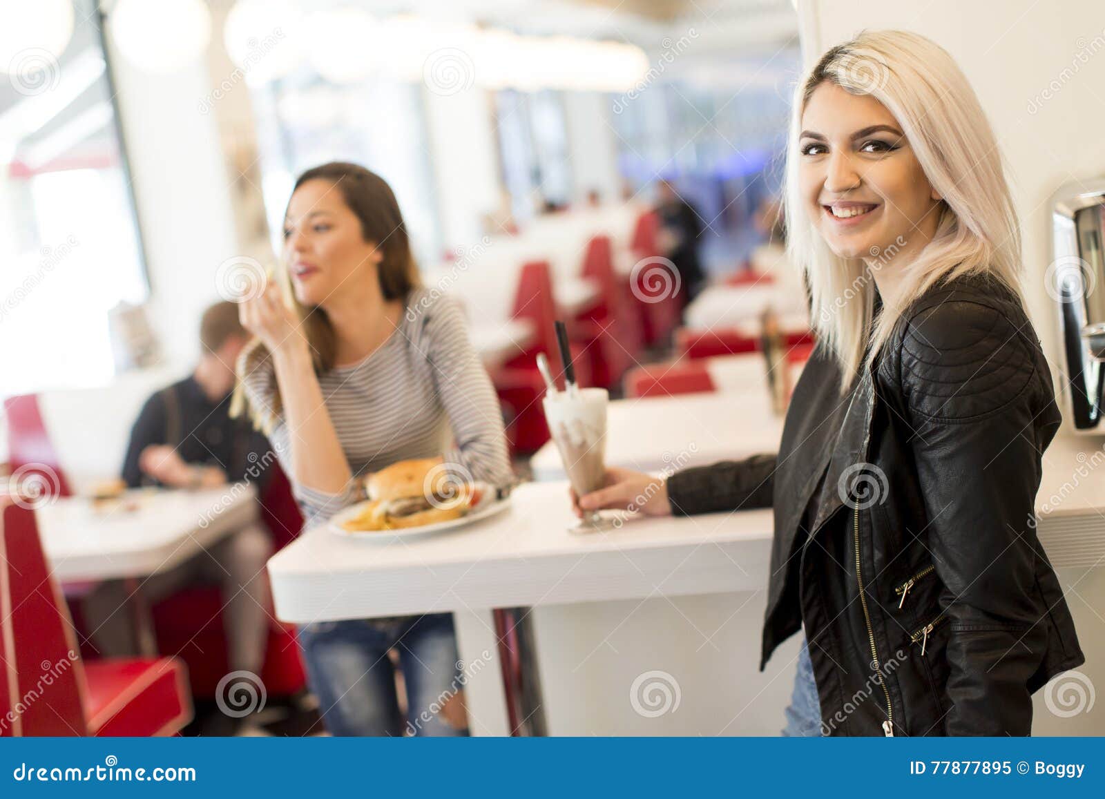 Young people in diner stock image. Image of smile, girlfriend - 77877895
