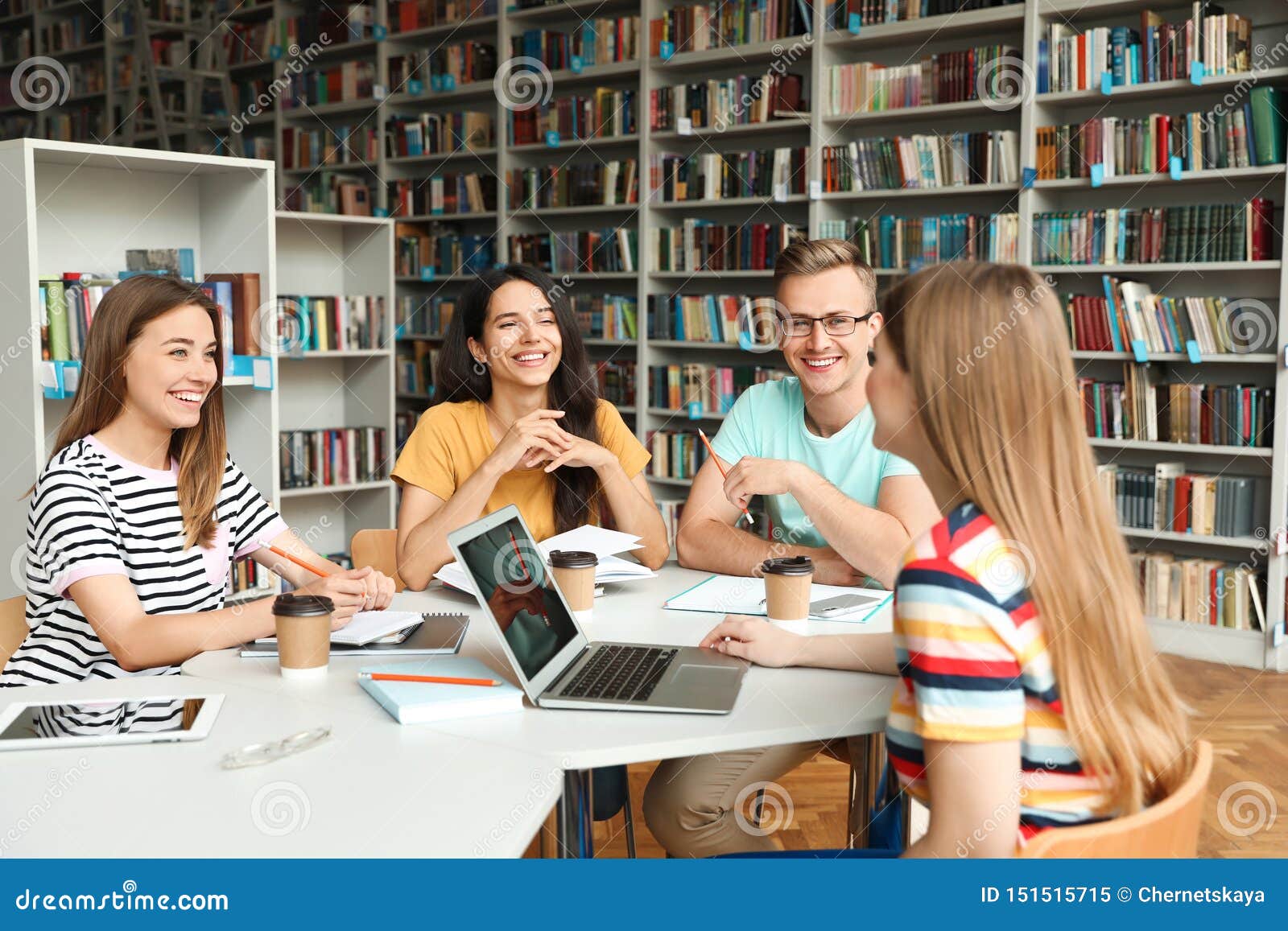 Young People Discussing Group Project at Table Stock Image - Image of ...