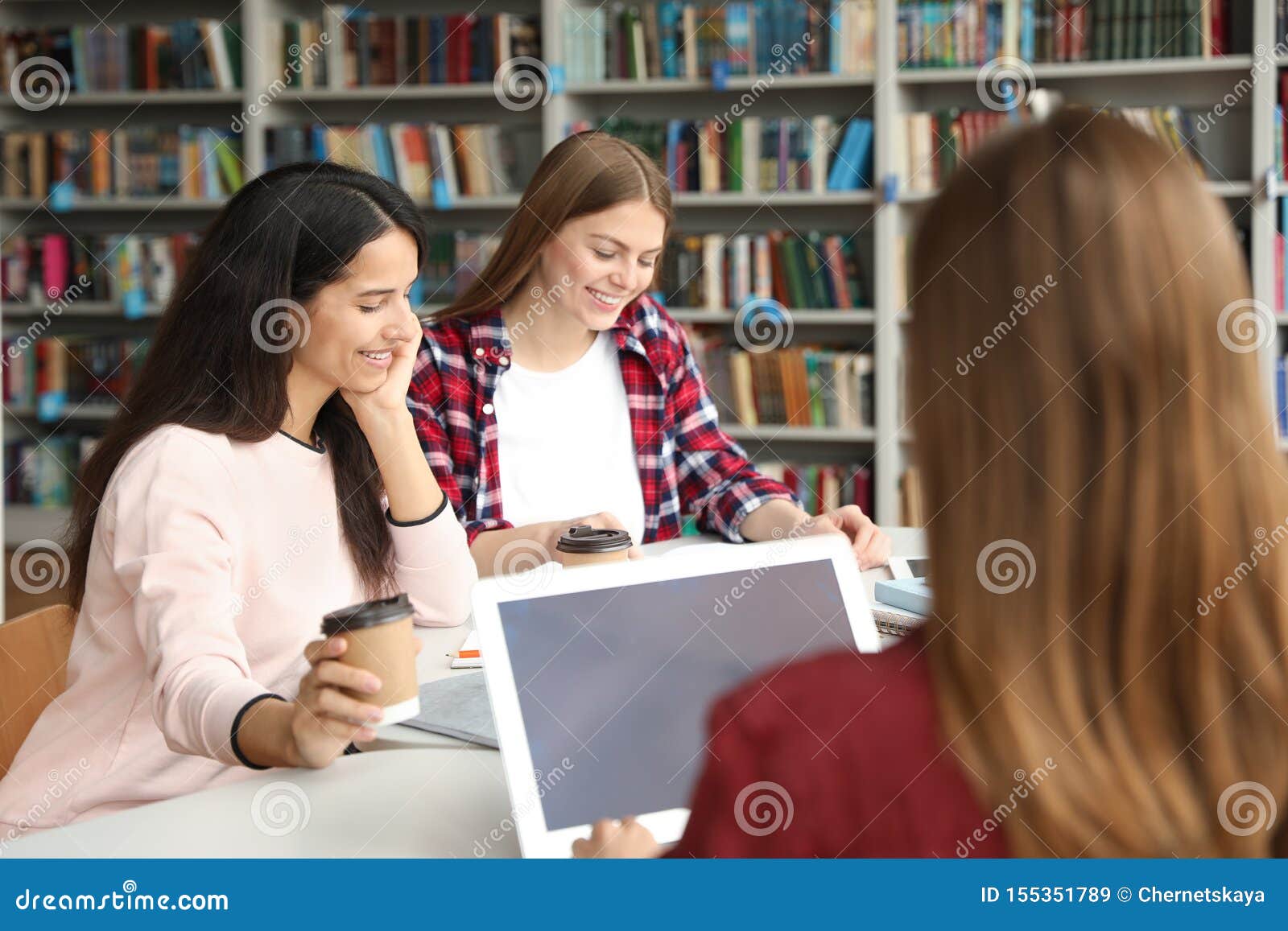 Young People Discussing Group Project at Table Stock Image - Image of ...