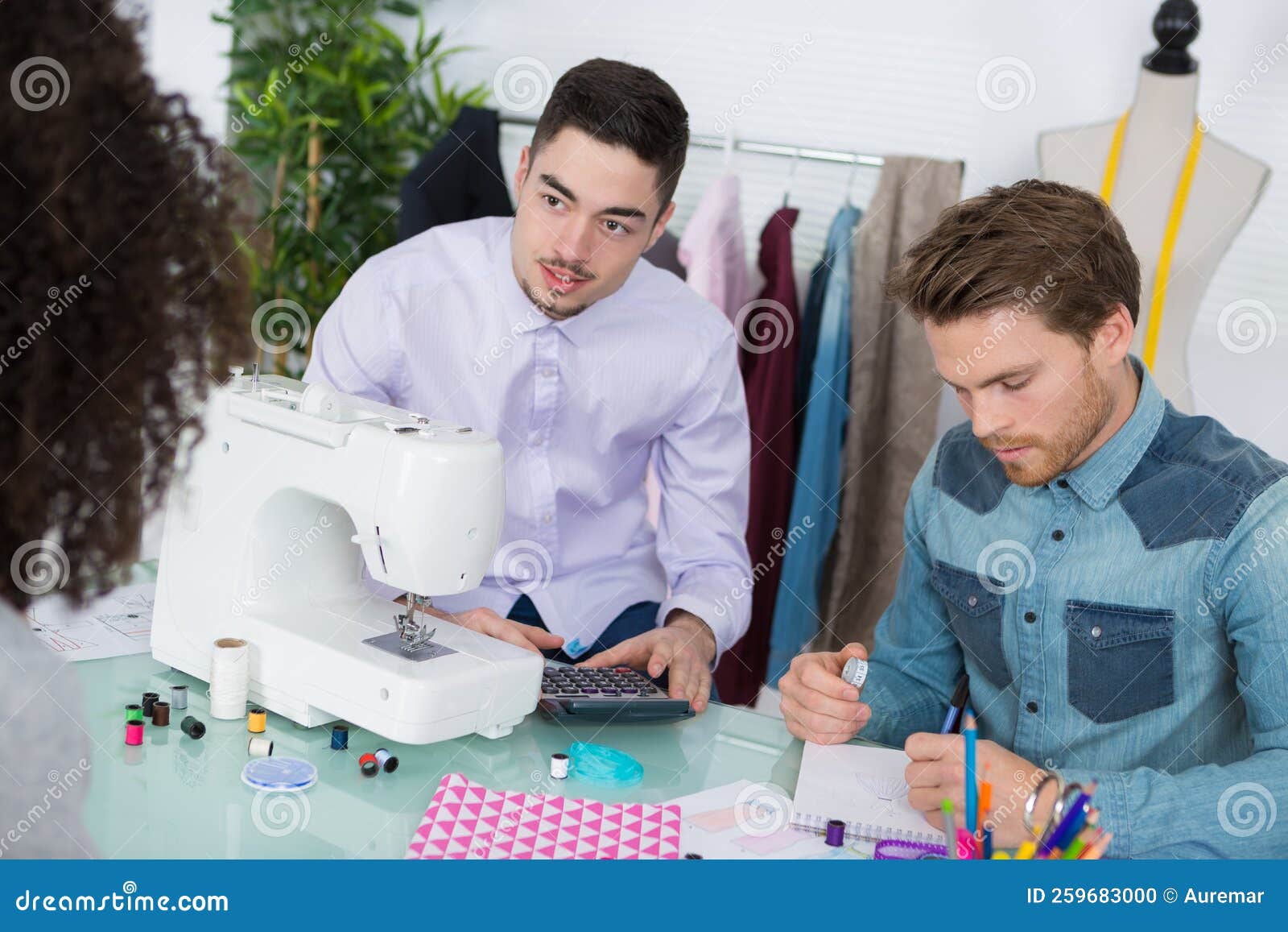 Young People Doing Craft Project with Sewing Machine Stock Photo ...