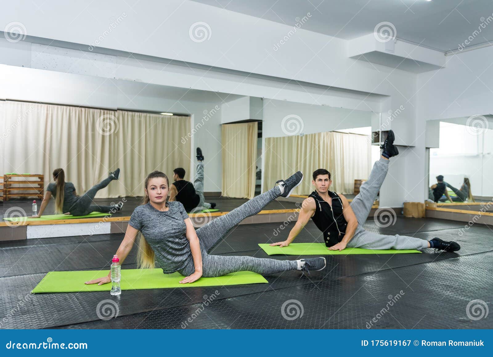 Young People Doing Exercises in Gym Together Stock Image - Image of ...