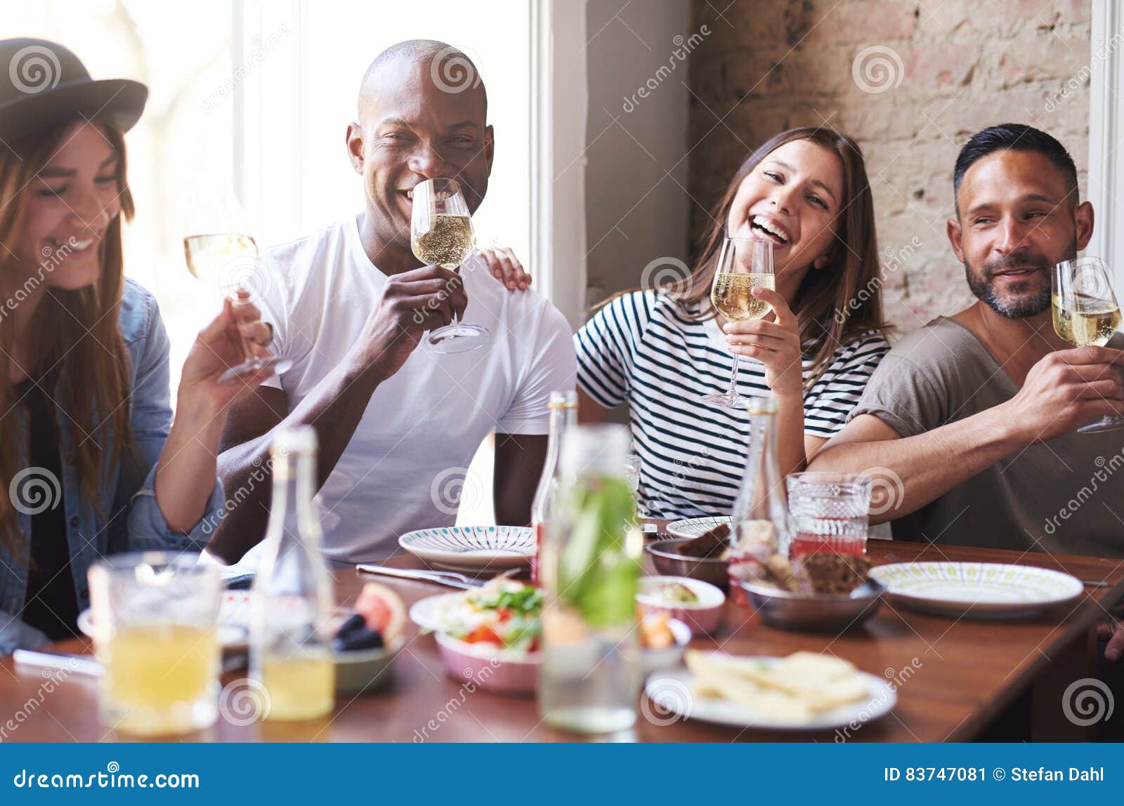 Young People Drinking and Looking at Camera Stock Image - Image of ...
