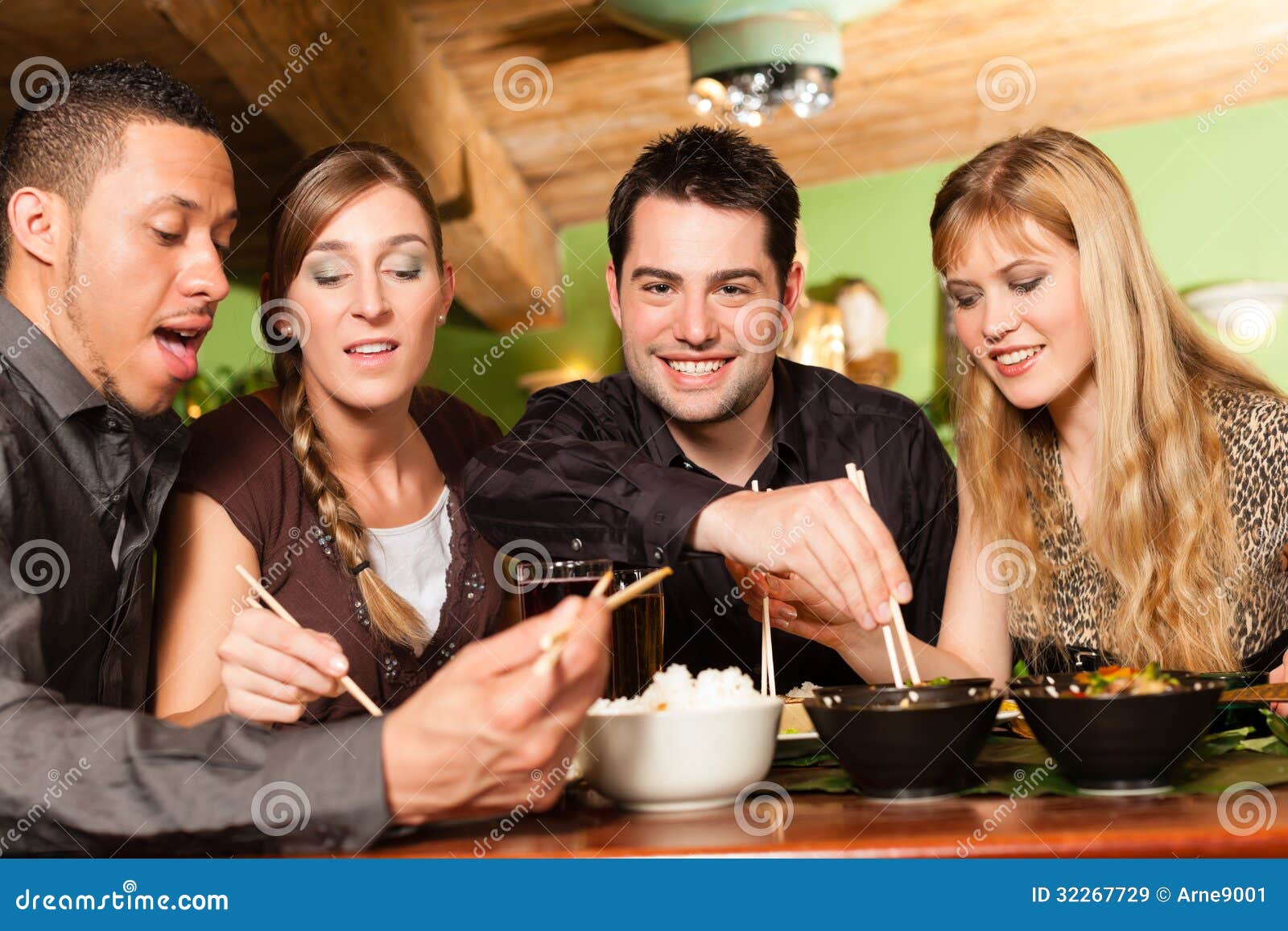 Young People Eating in Thai Restaurant Stock Image - Image of ...