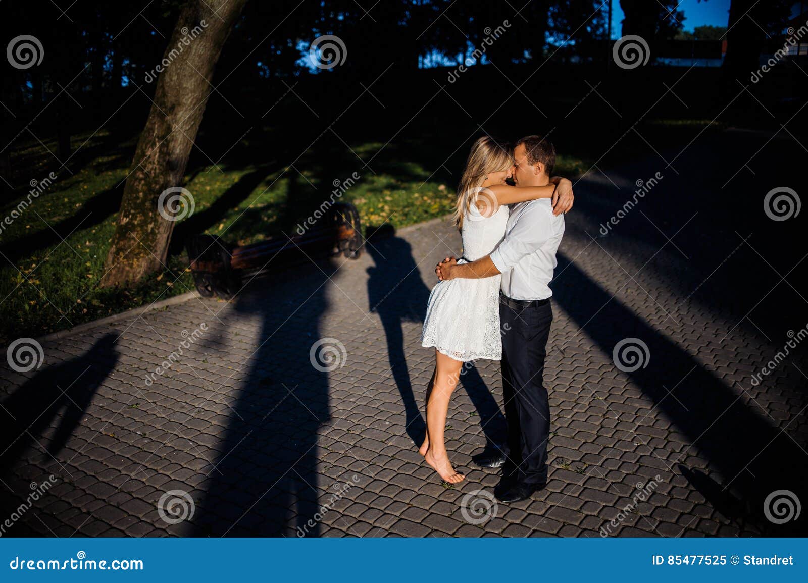 Young people embracing stock image. Image of embrace - 85477525