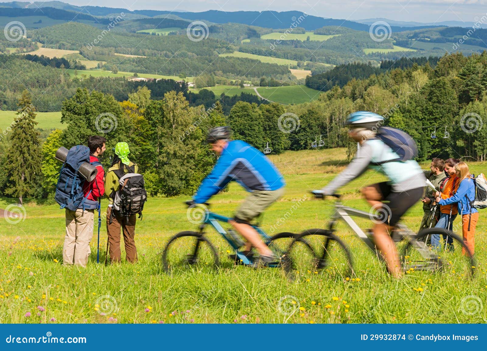 People Hiking, Riding Bicycles on Springtime Weekend Stock Photo ...