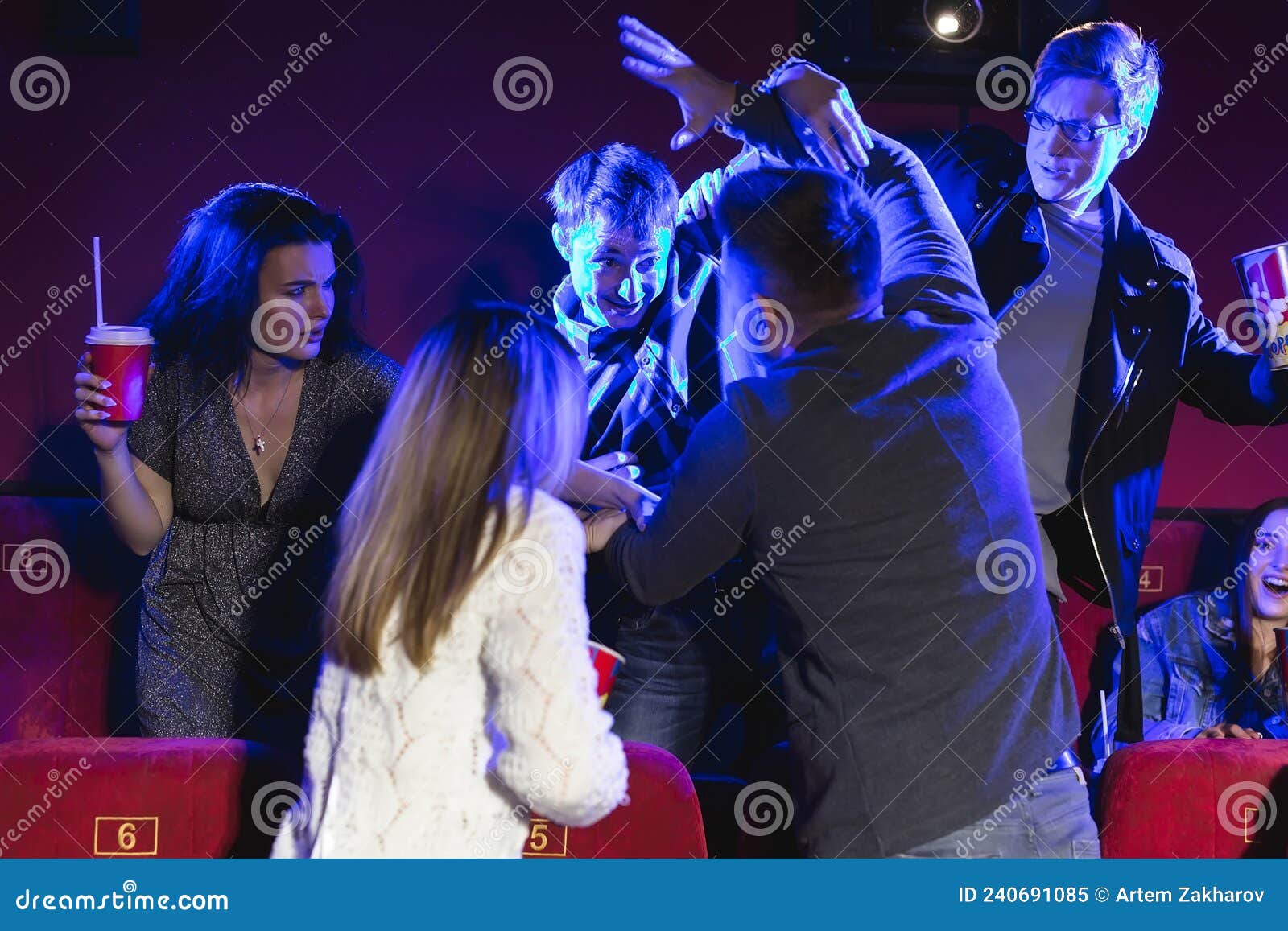 Young People Fight with Each Other in the Cinema. Stock Image - Image ...