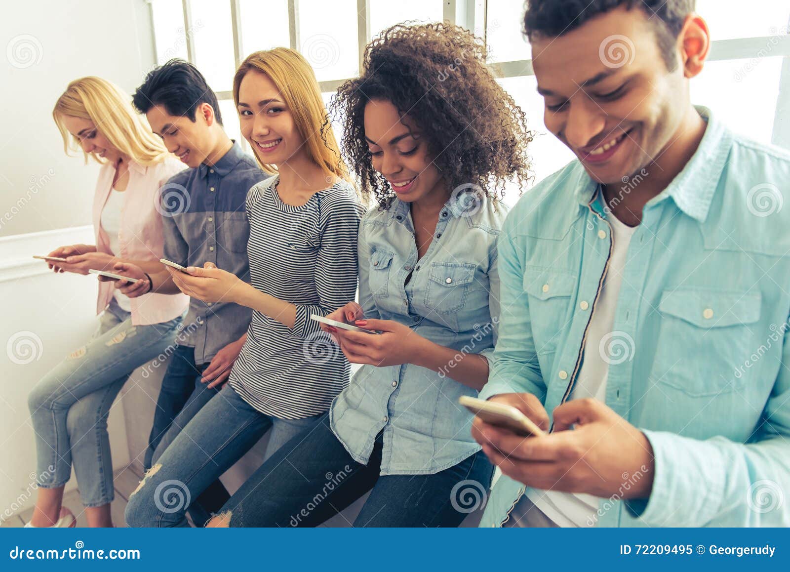 Young people with gadgets stock image. Image of african - 72209495