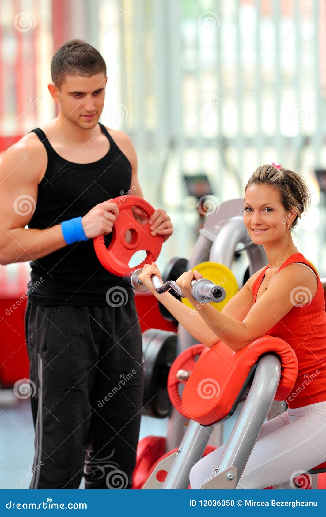 Young people in the gym stock photo. Image of instructor - 12036050