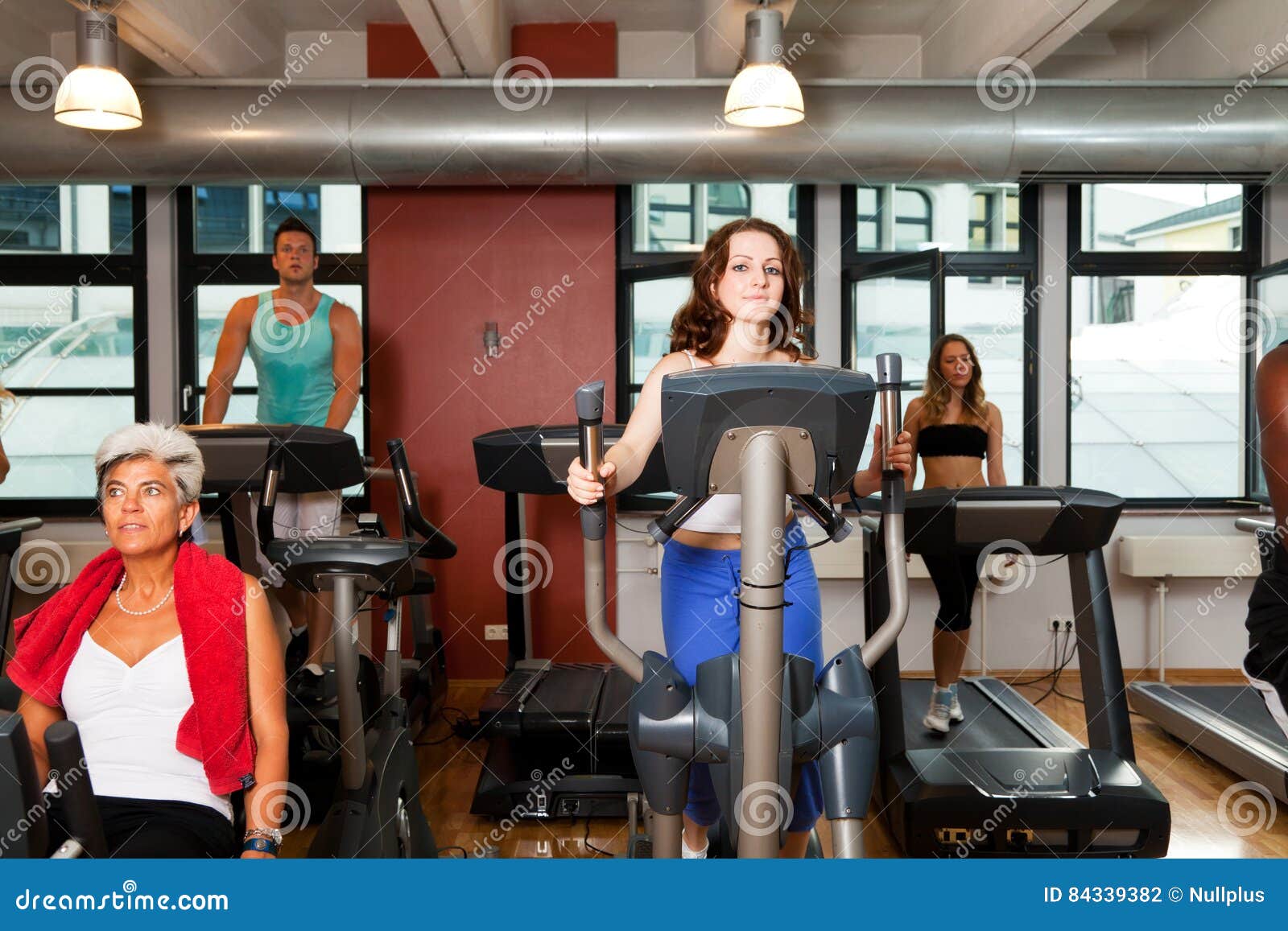 Young People at the Gym stock photo. Image of treadmill - 84339382