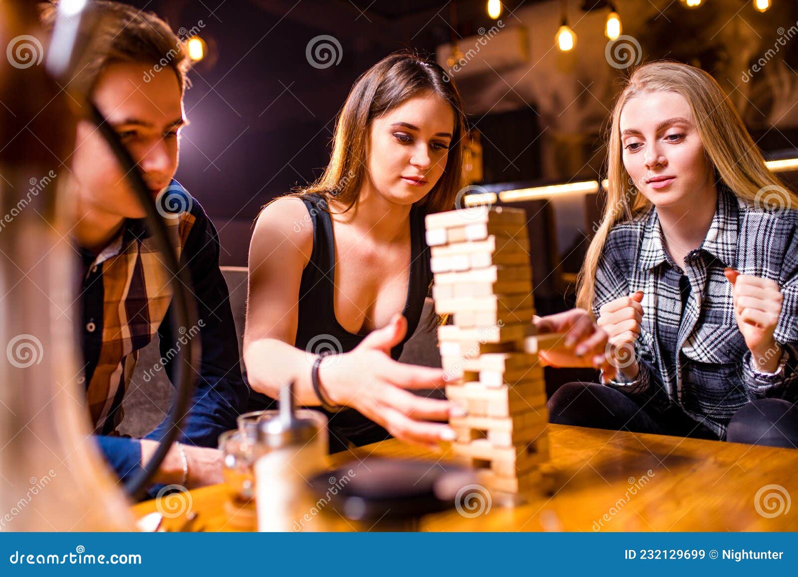 Young People Have Fun Playing Board Games at a Table Stock Image ...
