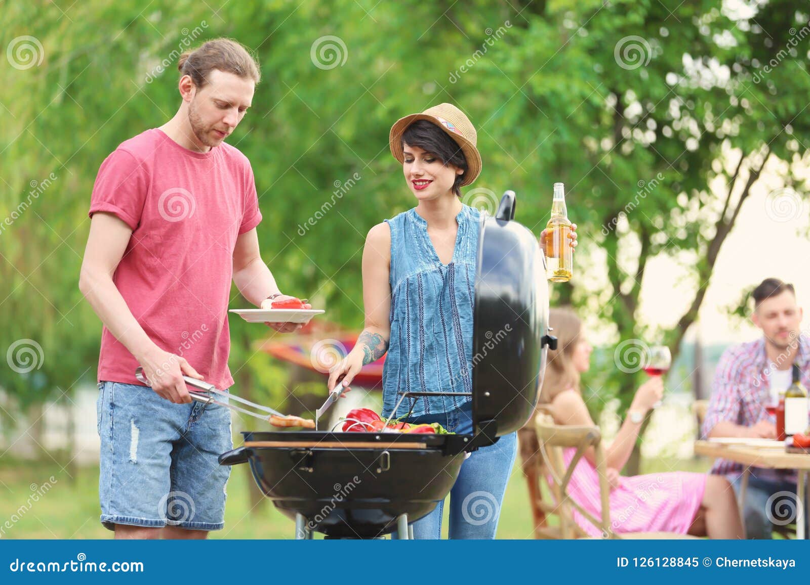 Young People Having Barbecue with Modern Grill Stock Image - Image of ...