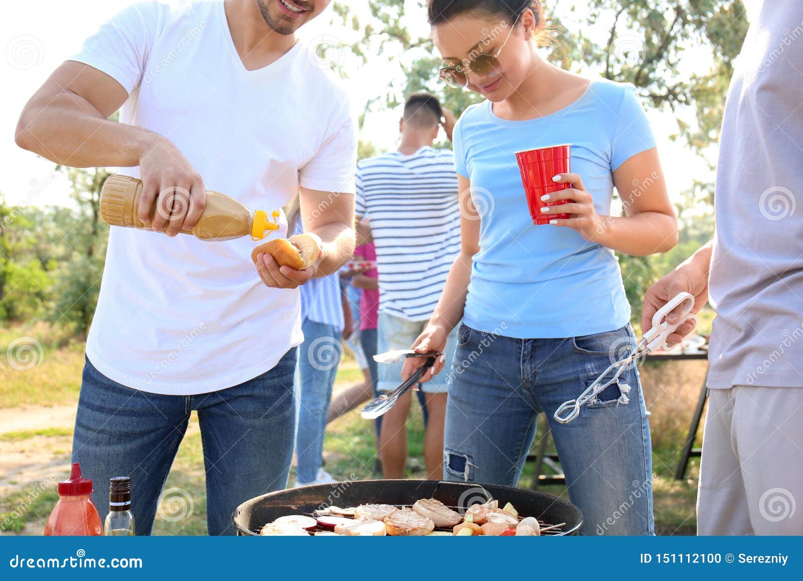Young People Having Barbecue Party in Park Stock Photo - Image of rest ...