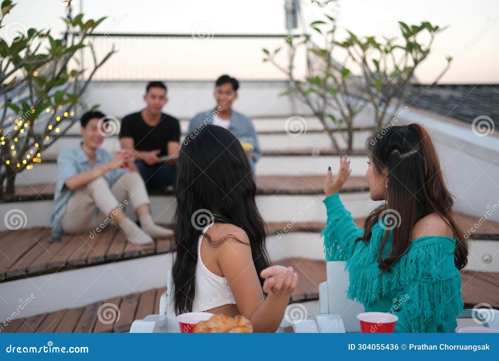 Young People Having Fun Hanging Out on Weekend Together on a Rooftop ...