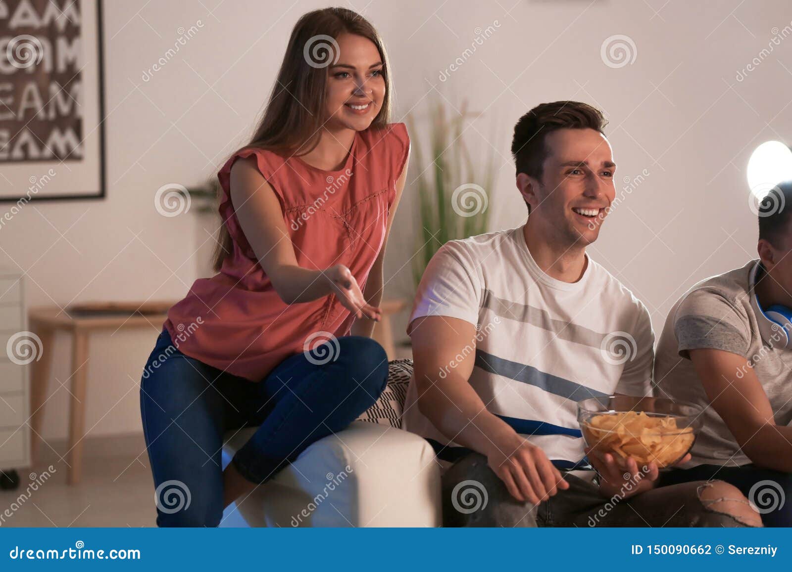 Young People Having Fun at Home in Evening Stock Photo - Image of ...