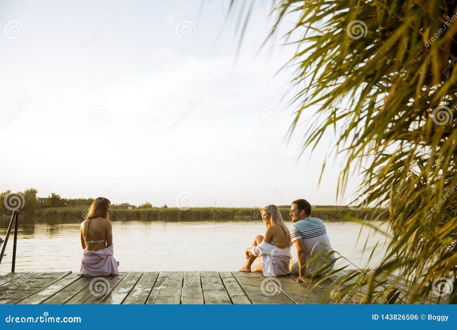 Young People Having Fun at the Lake on a Summer Day Stock Photo - Image ...