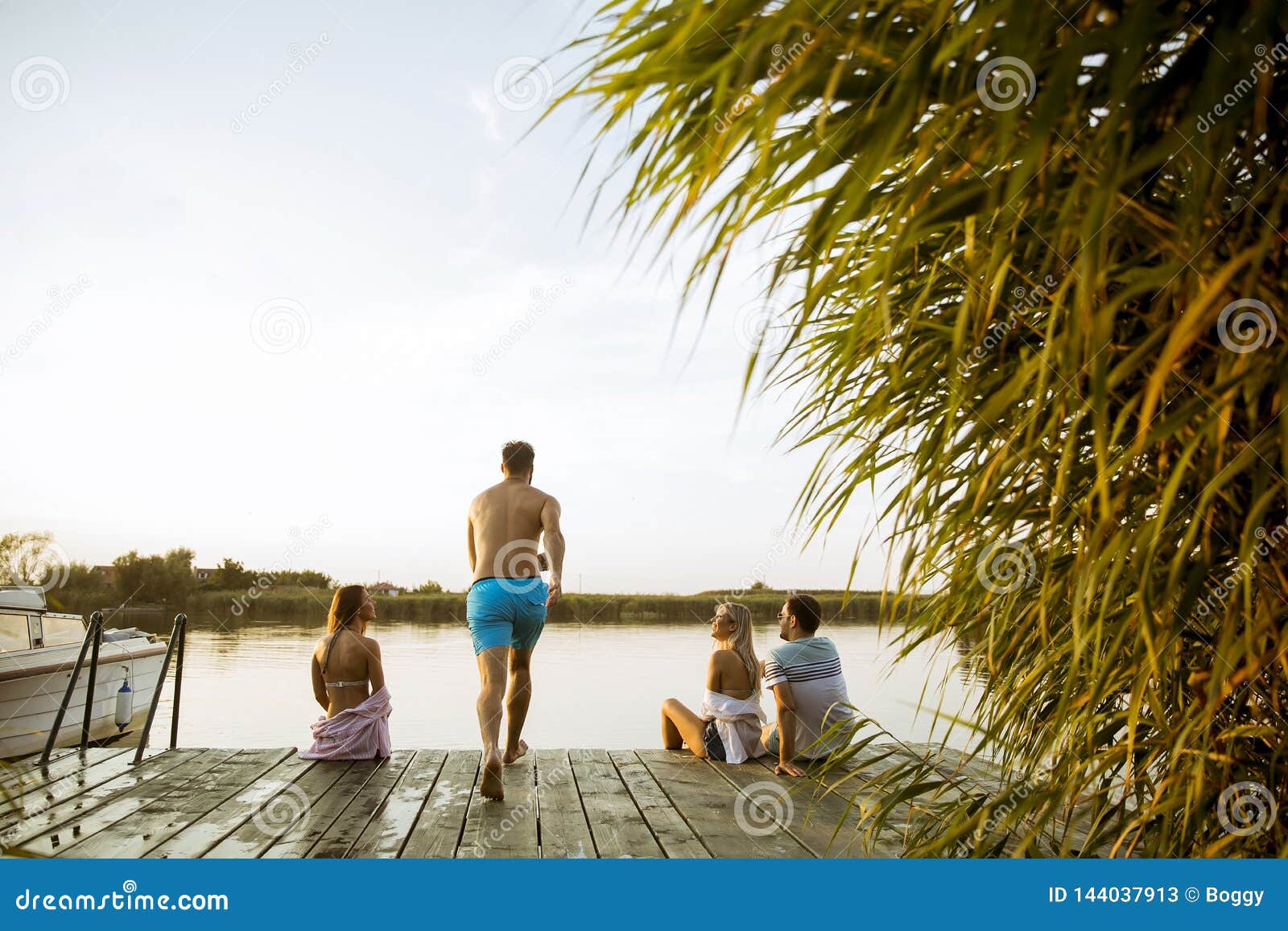 Young People Having Fun at the Lake on a Summer Day Stock Image - Image ...