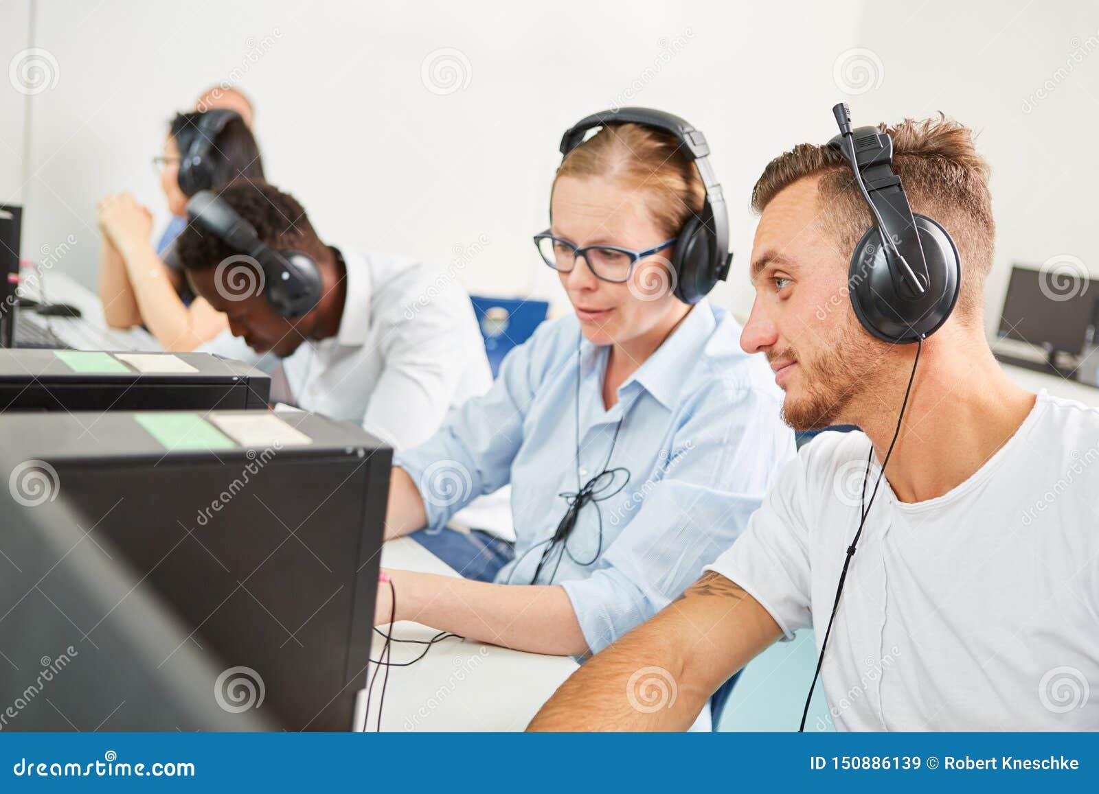 Young People with Headphones in a Language Course Stock Image - Image ...