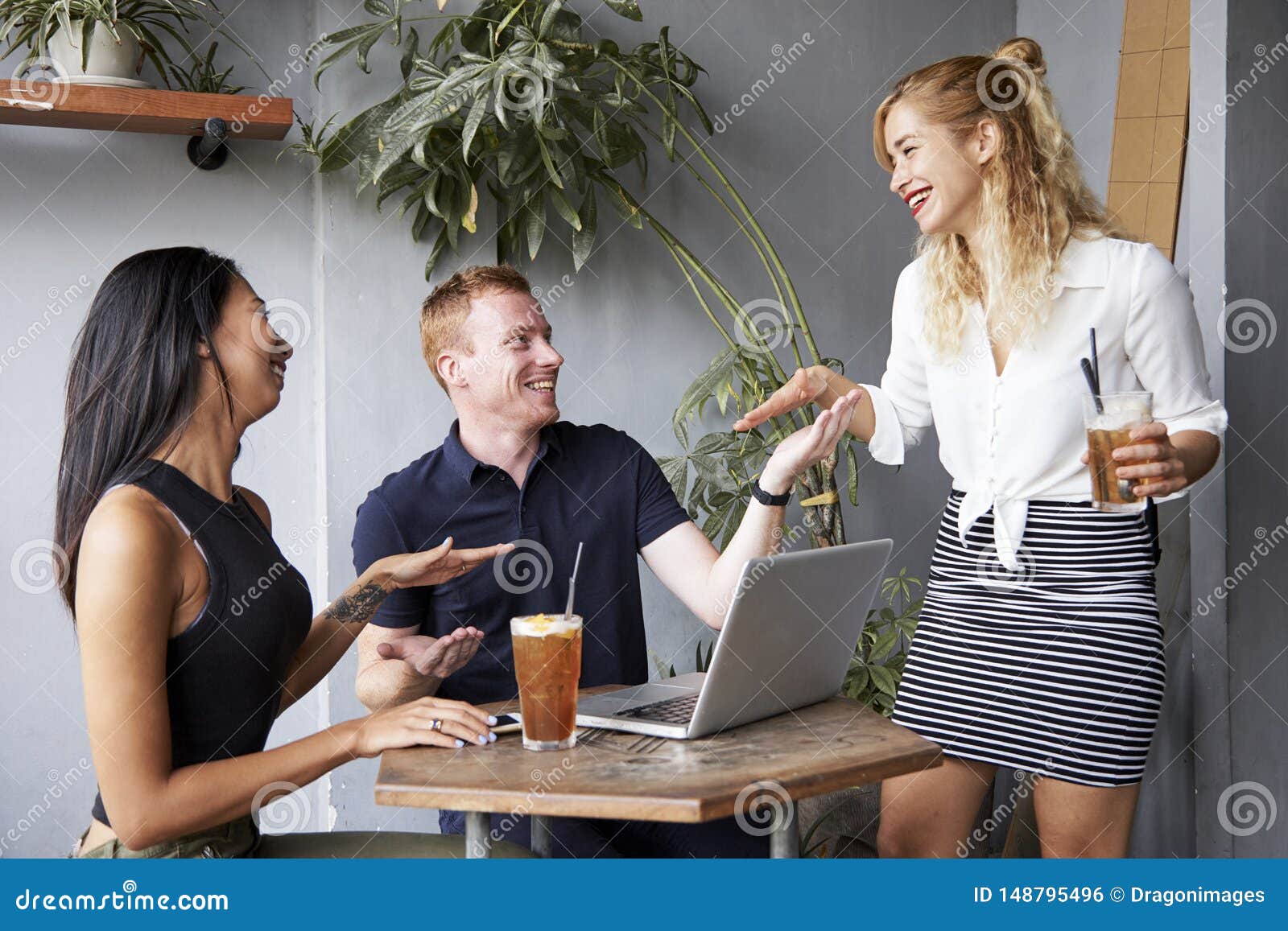 Young People Joking Around in Cafe Stock Photo - Image of iced, friend ...