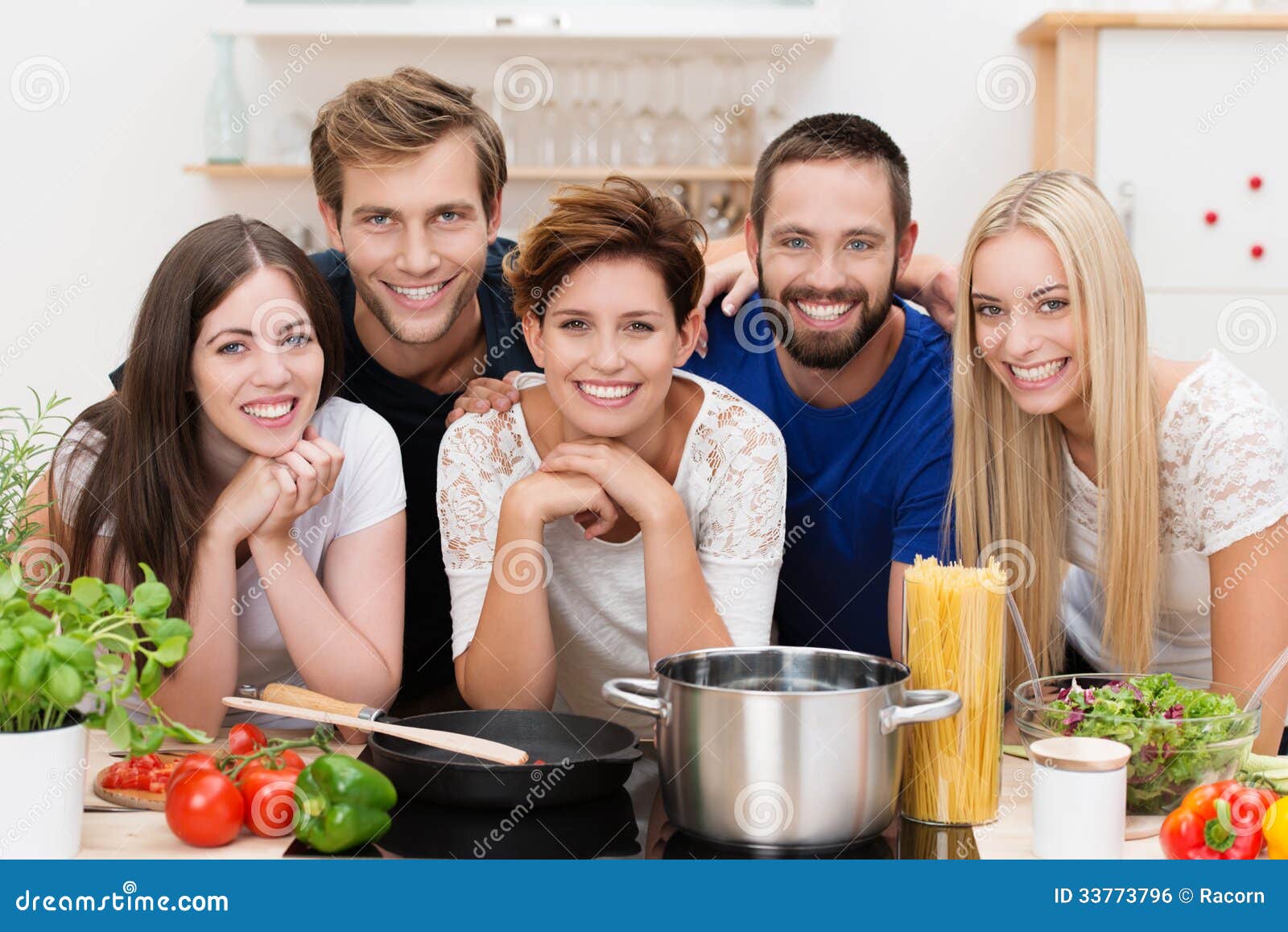 Young People in the Kitchen Preparing Pasta Stock Photo - Image of ...