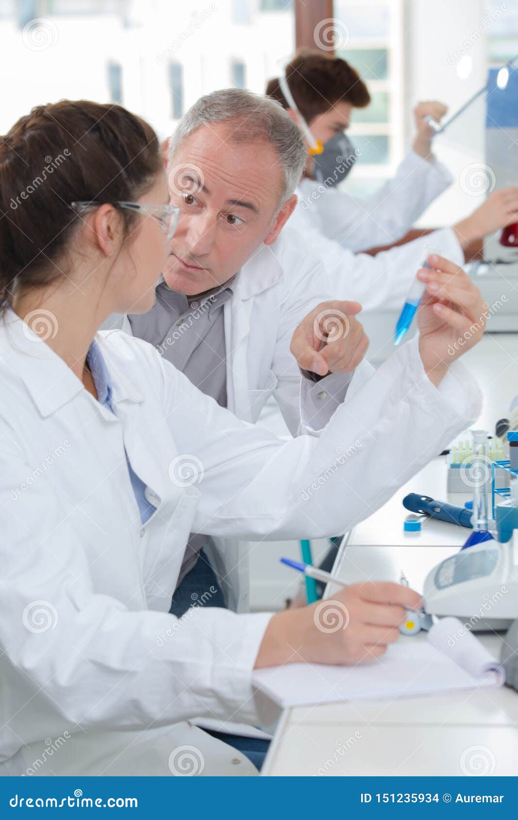 Young people in laboratory stock photo. Image of class - 151235934