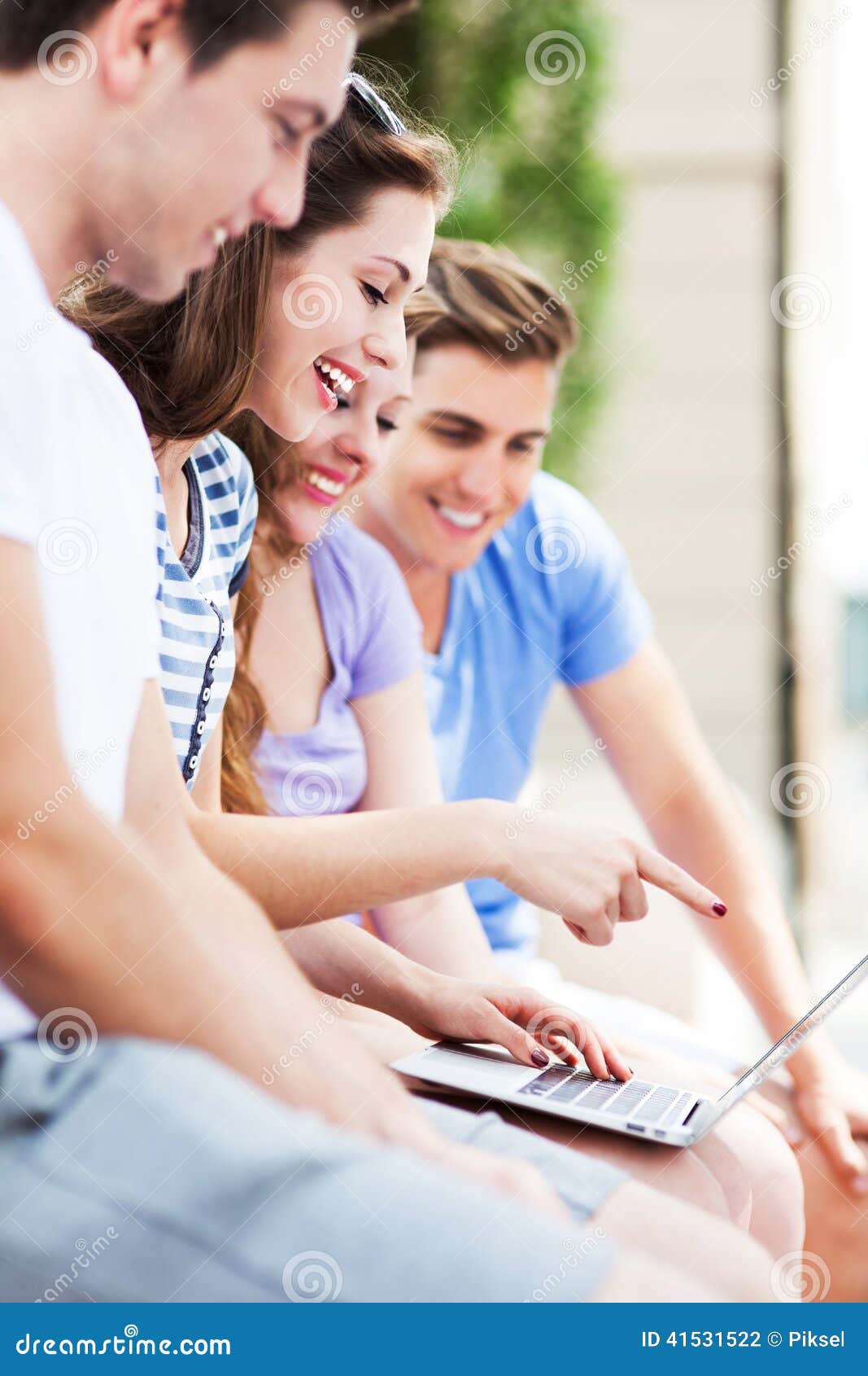 Young people with laptop stock photo. Image of attractive - 41531522