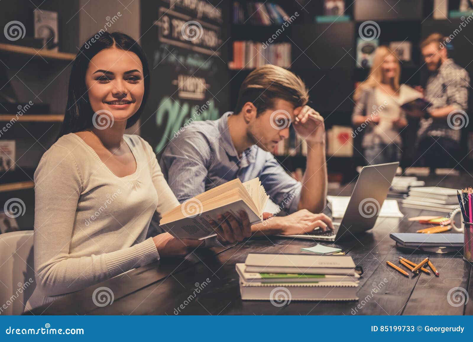 Young People in the Library Stock Image - Image of caucasian, lifestyle ...