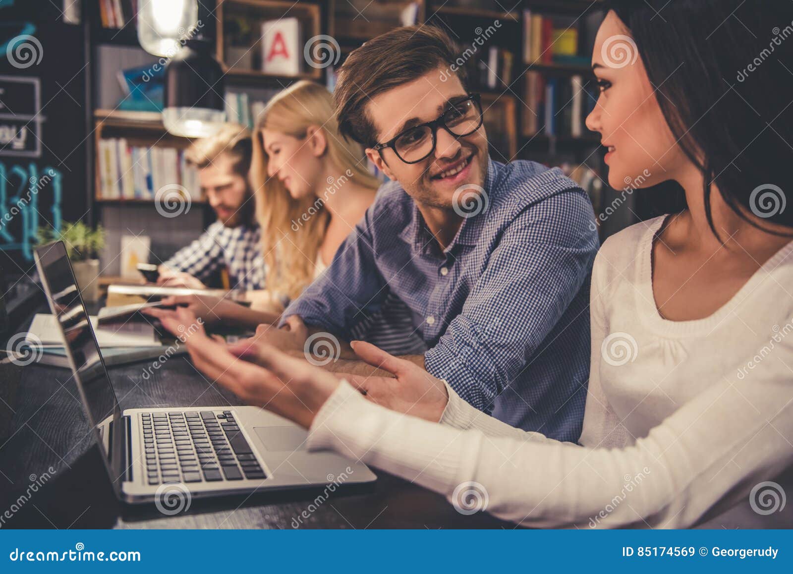 Young People in the Library Stock Image - Image of expression ...