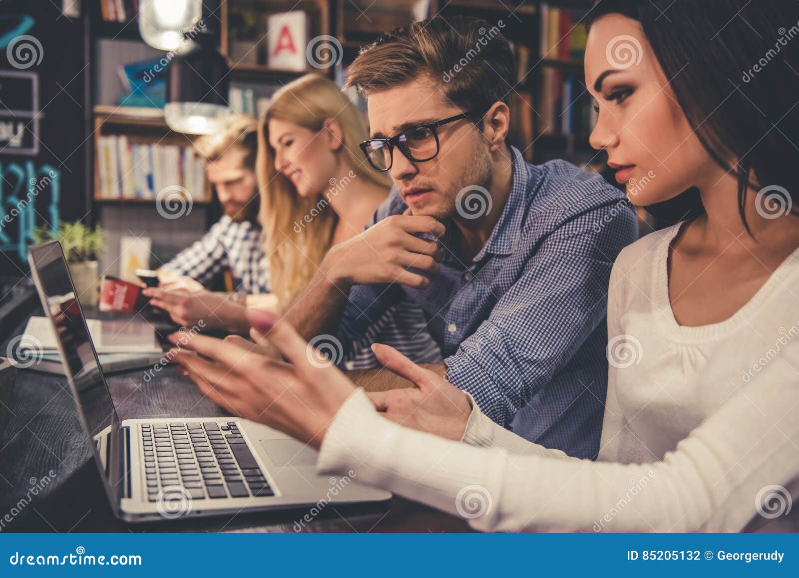 Young People in the Library Stock Photo - Image of modern, adult: 85205132