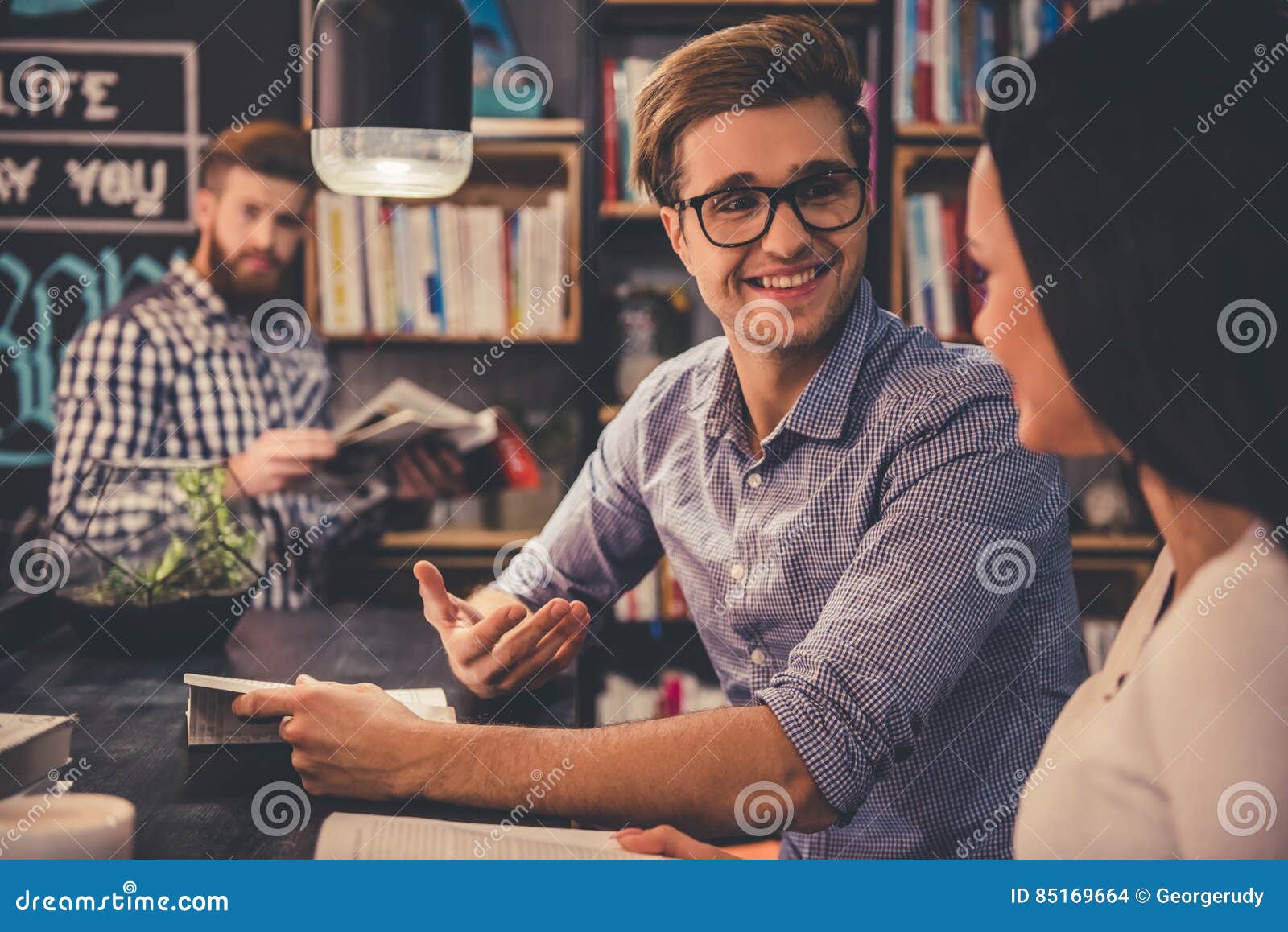 Young People in the Library Stock Photo - Image of communicate ...