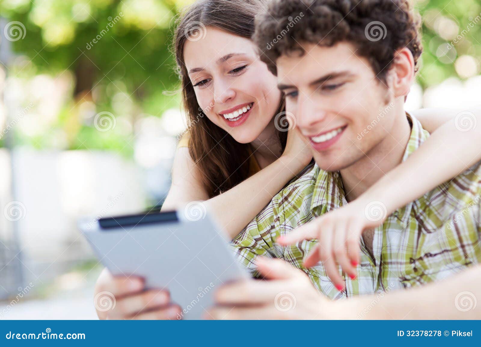 Young People Looking at Digital Tablet Stock Photo - Image of teenage ...