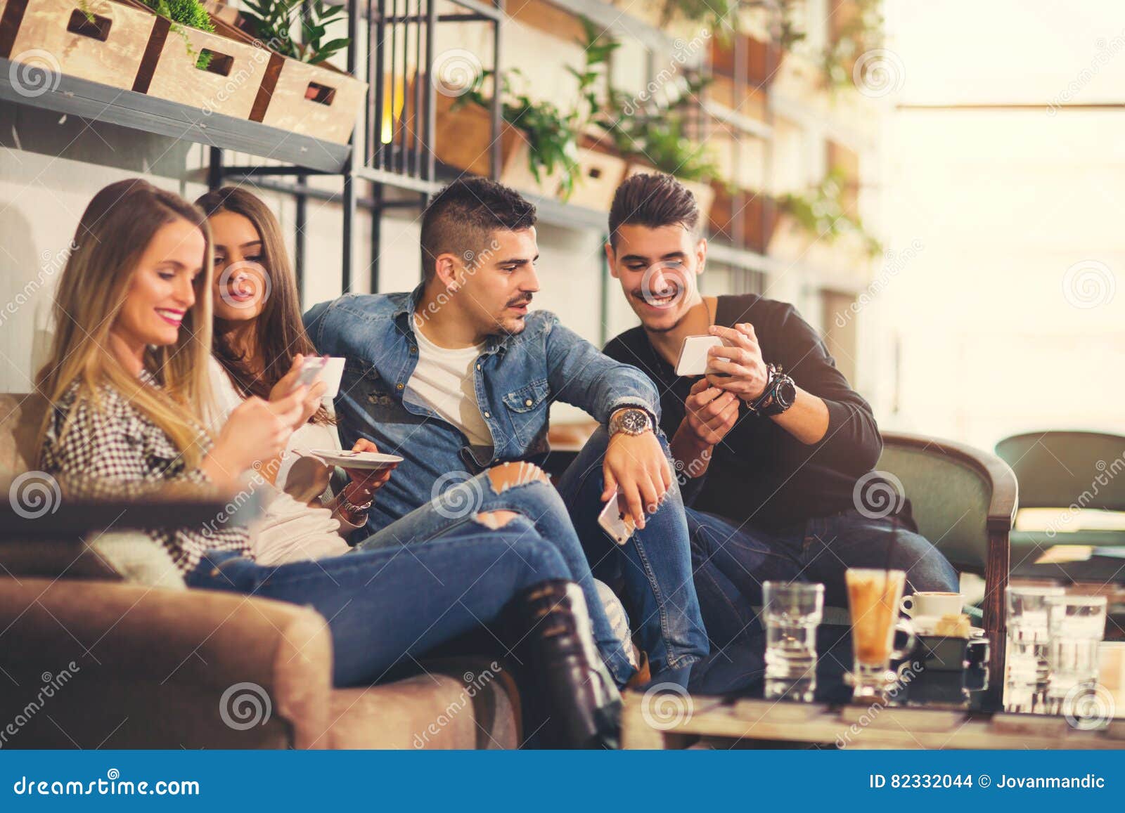Young People Meeting in a Cafe. Stock Photo - Image of sitting, buddy ...