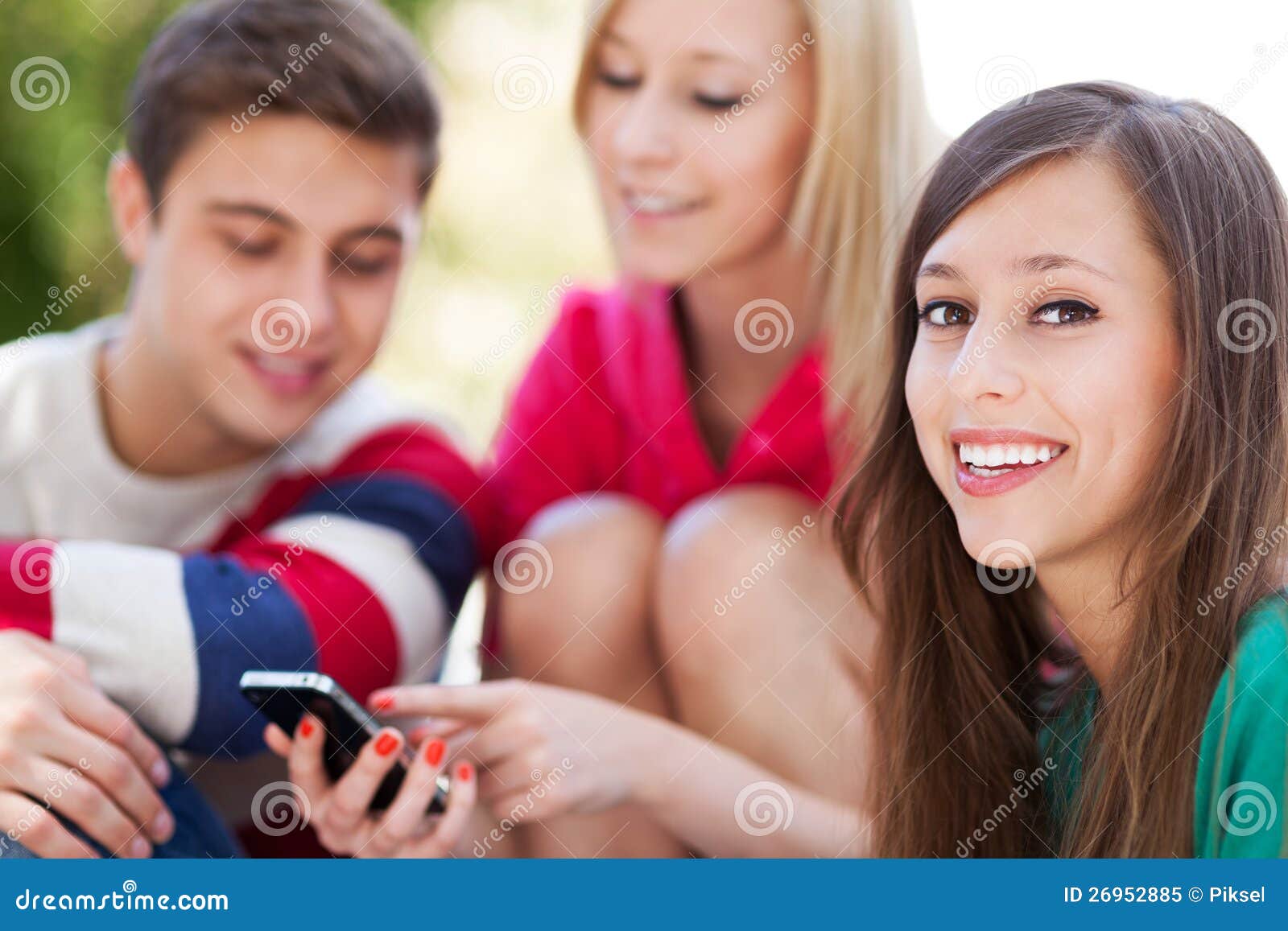 Young People with Mobile Phone Stock Image - Image of happy, cell: 26952885