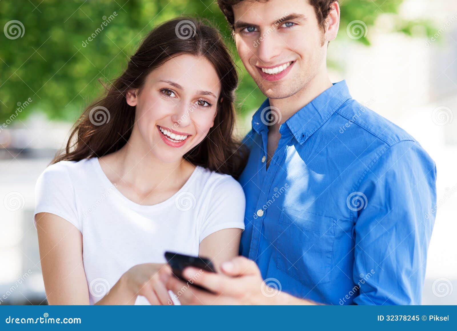 Young People with Mobile Phone Outdoors Stock Image - Image of cell ...