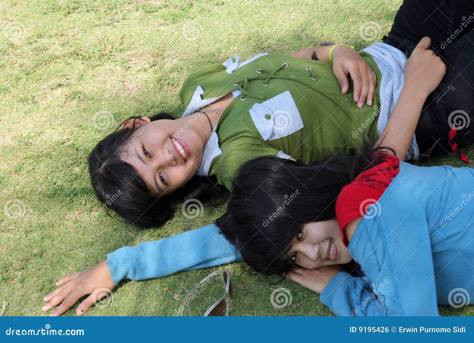Young people outdoor stock photo. Image of grass, mobile - 9195426