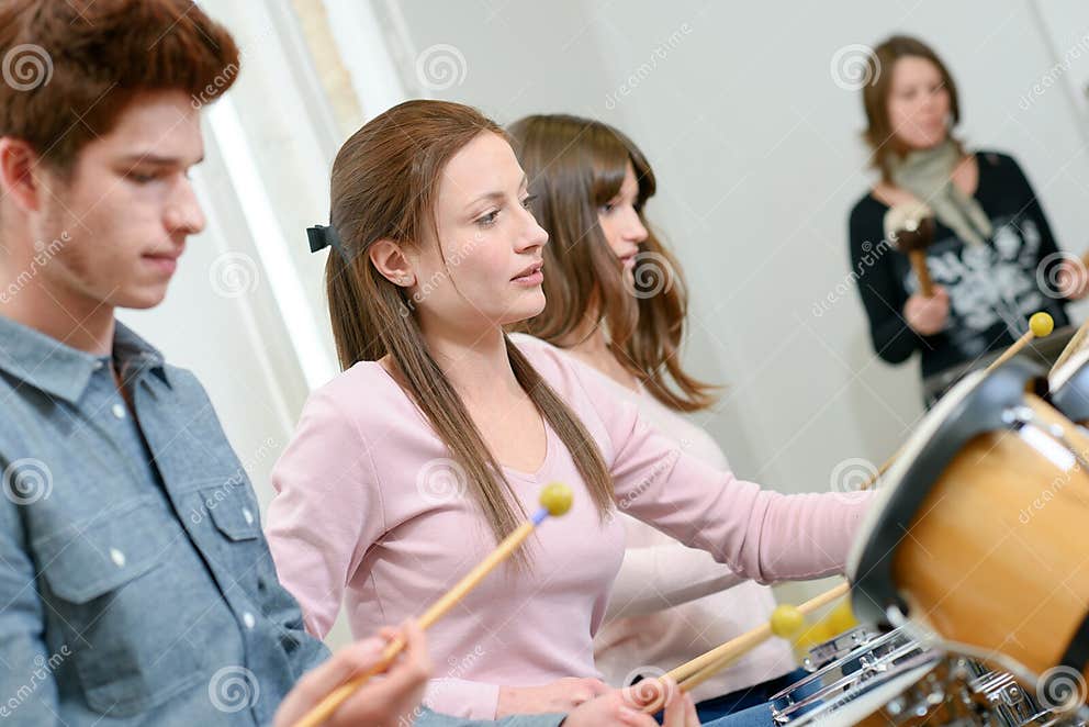 Young People during Percussion Lesson Stock Photo - Image of people ...