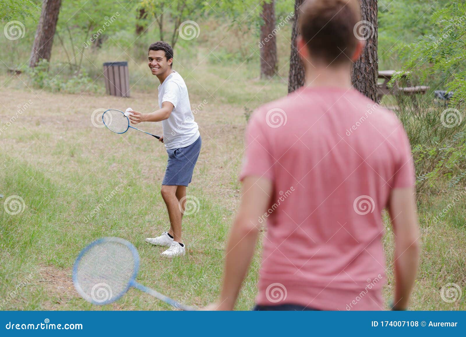 Young People Playing Badminton Outdoors Stock Photo - Image of ...