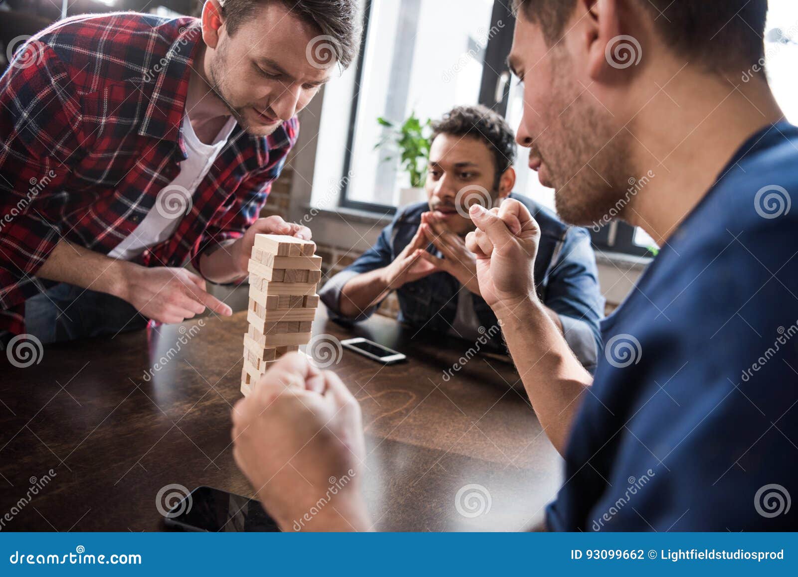 Young People Playing Jenga Game Stock Photo - Image of collaboration ...