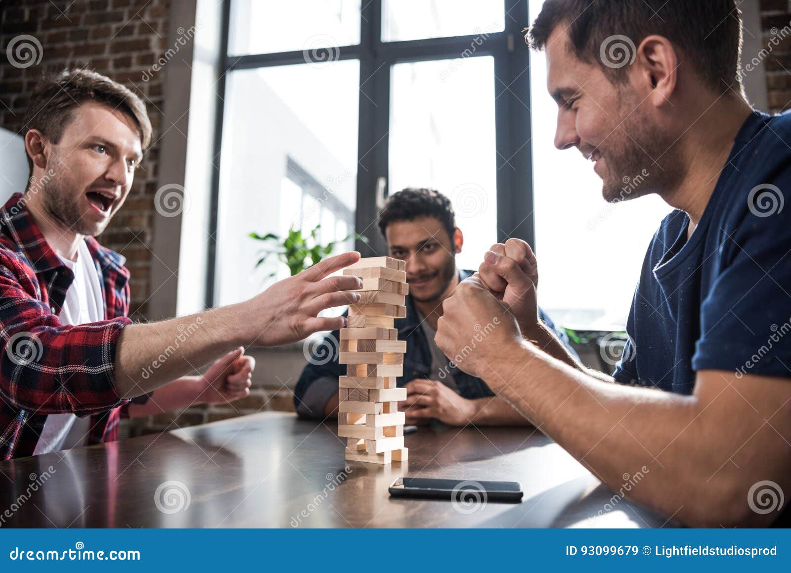 Young People Playing Jenga Game Stock Image - Image of teamwork, jenga ...