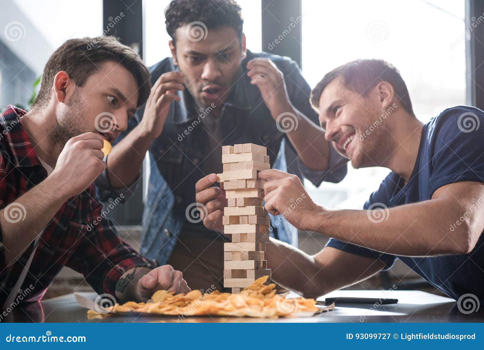 Young People Playing Jenga Game Stock Image - Image of jenga, solution ...