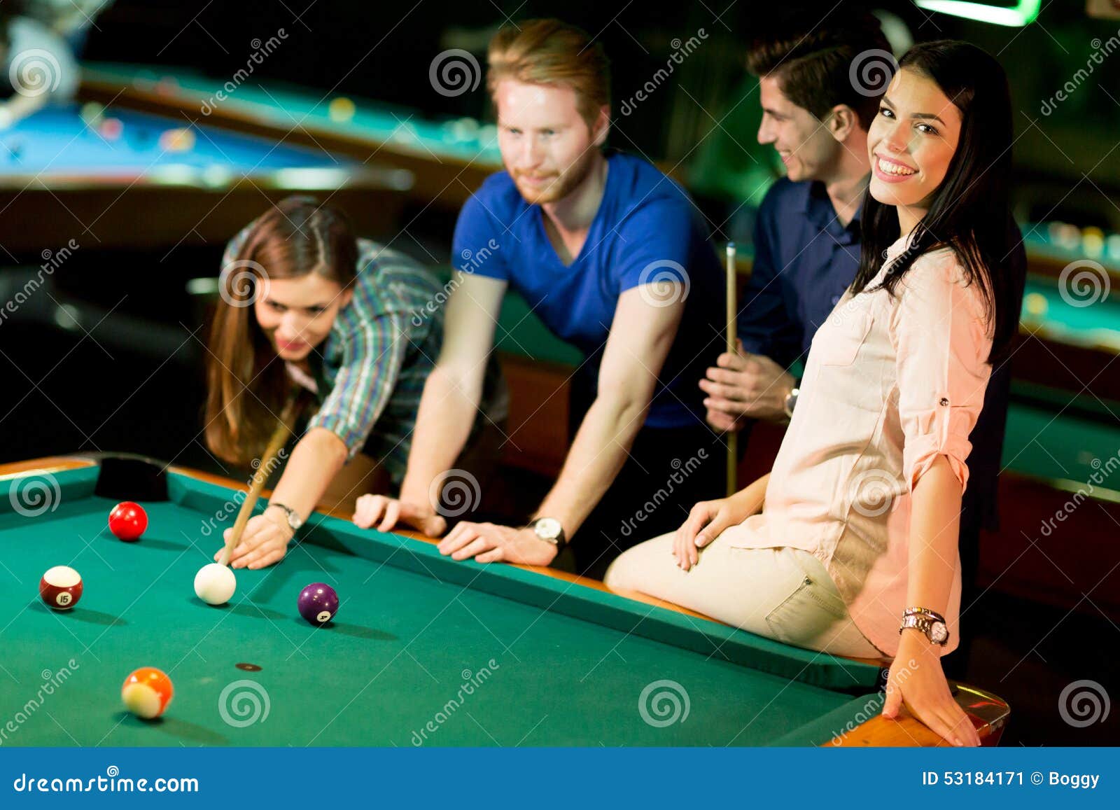 Young people playing pool stock image. Image of couple - 53184171
