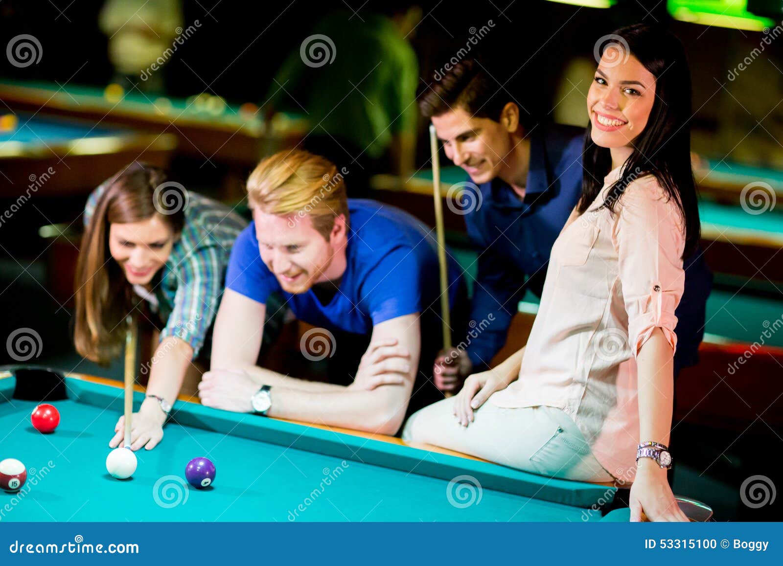 Young people playing pool stock photo. Image of attractive - 53315100