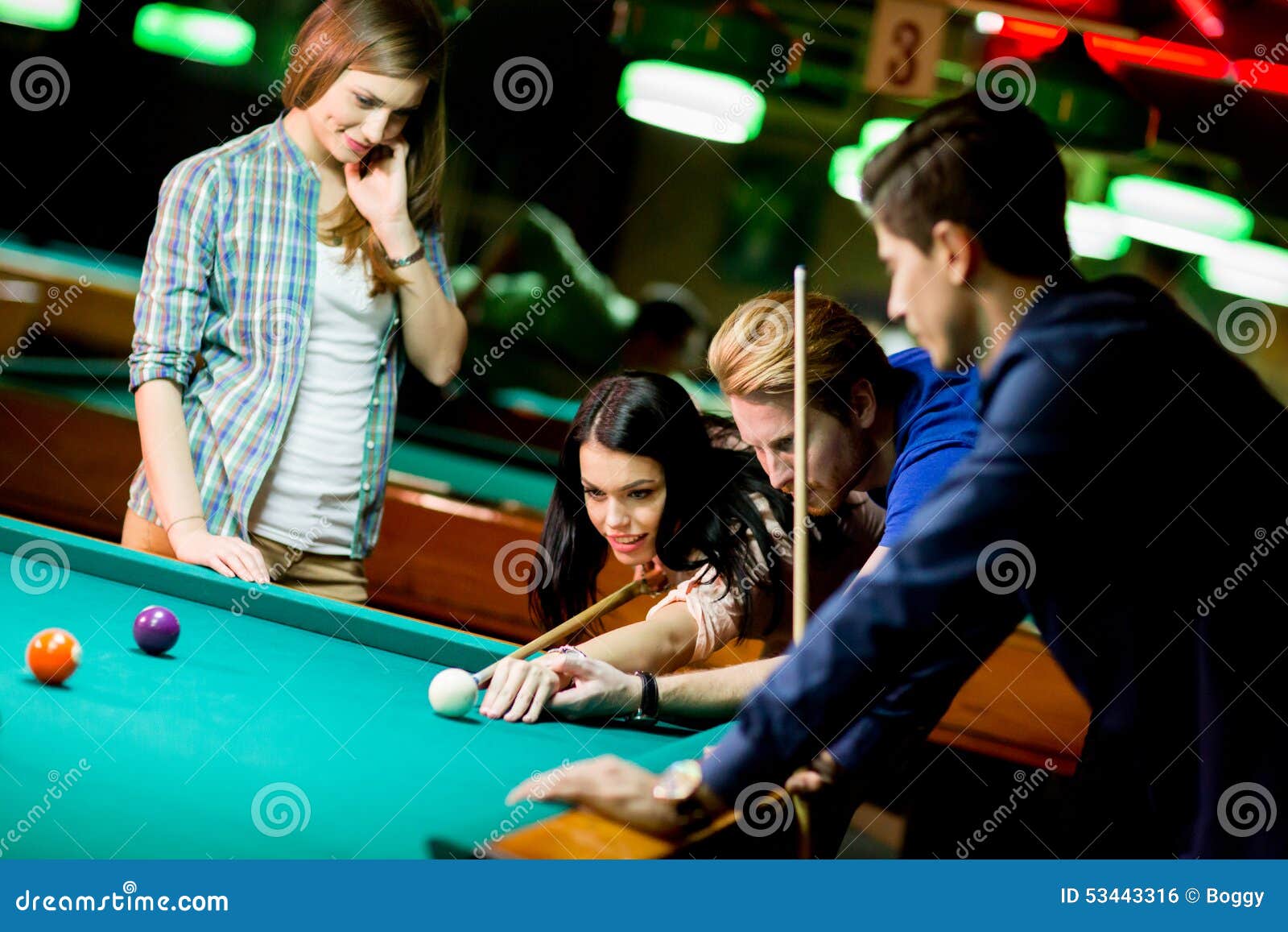 Young people playing pool stock photo. Image of leisure - 53443316