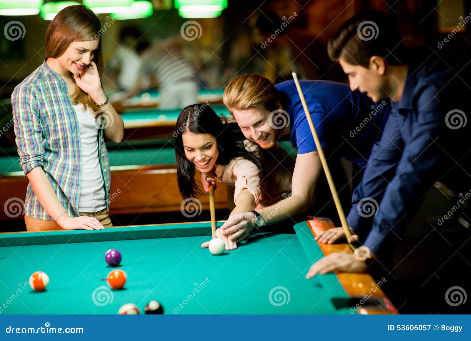 Young people playing pool stock image. Image of beautiful - 53606057